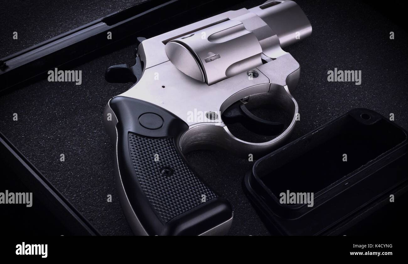 Close up revolver in a case Stock Photo - Alamy