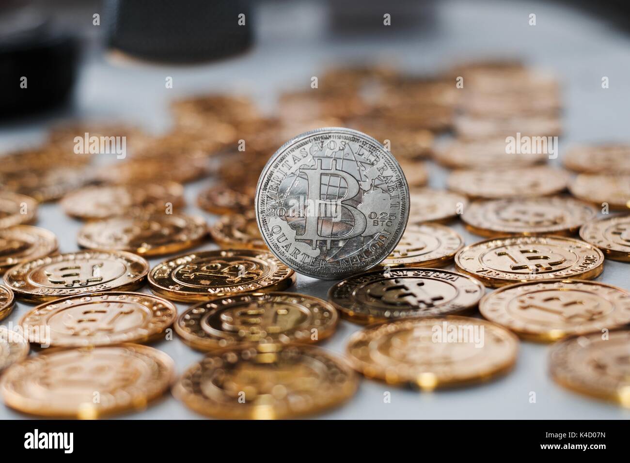 Digital currency physical metal bitcoin coin on the gold bitcoins. Gold ...