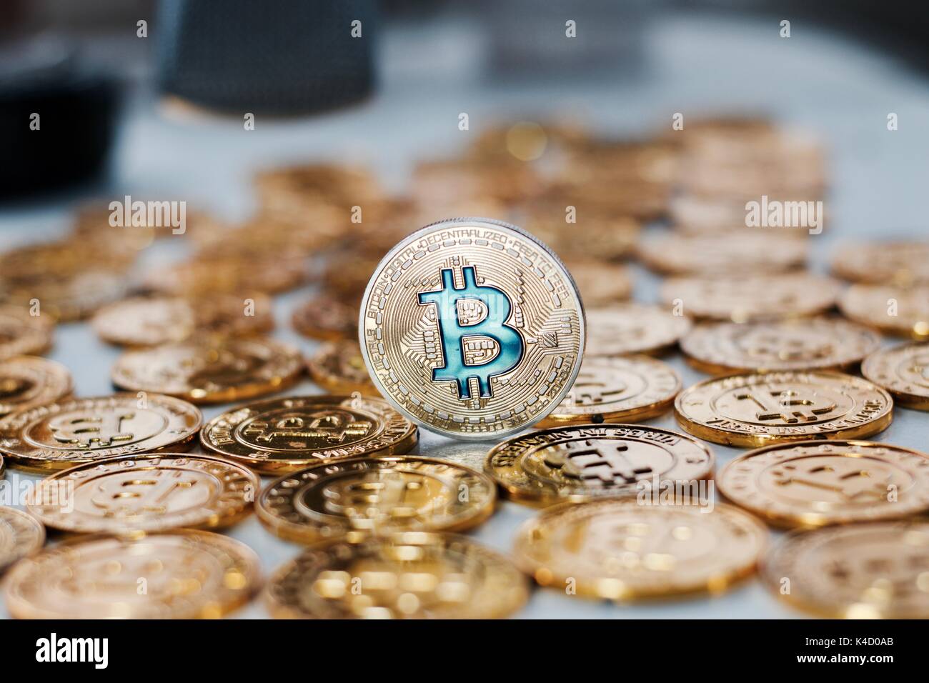 Digital currency physical metal bitcoin coin on the gold bitcoins. Gold ...