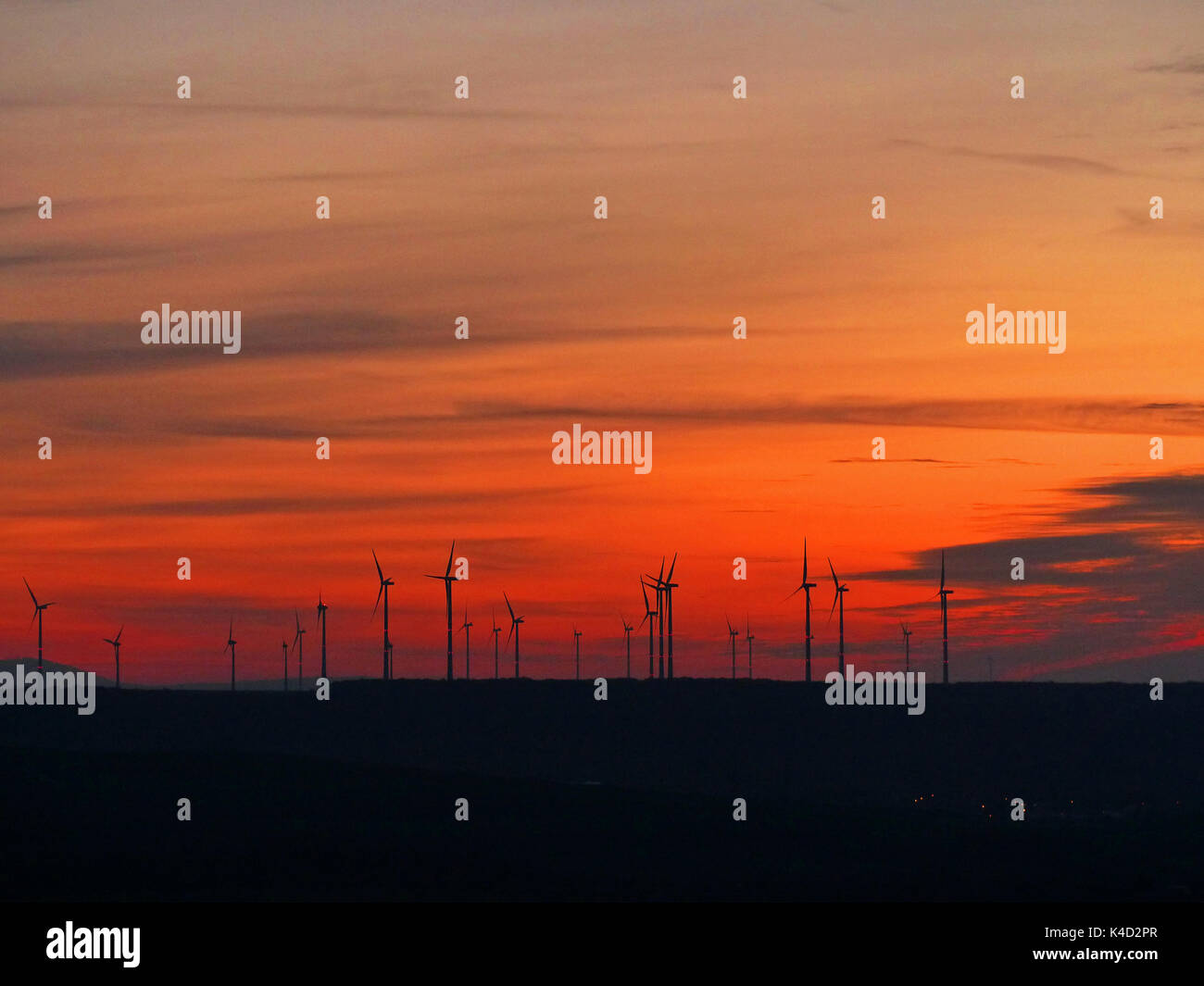 Sunset With Wind Wheels On The Horizon Stock Photo - Alamy
