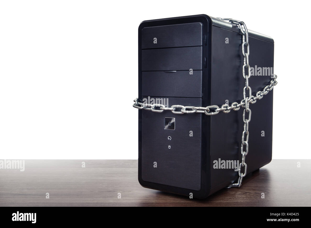 Computer tower locked up with chains wrapped around it sitting on a ...