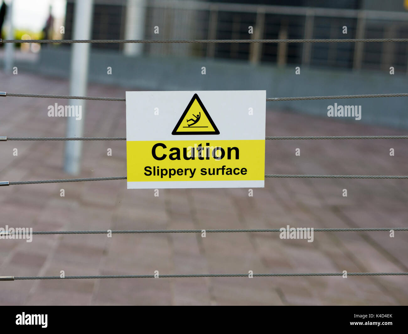 Caution slippery surface sign hi-res stock photography and images - Alamy