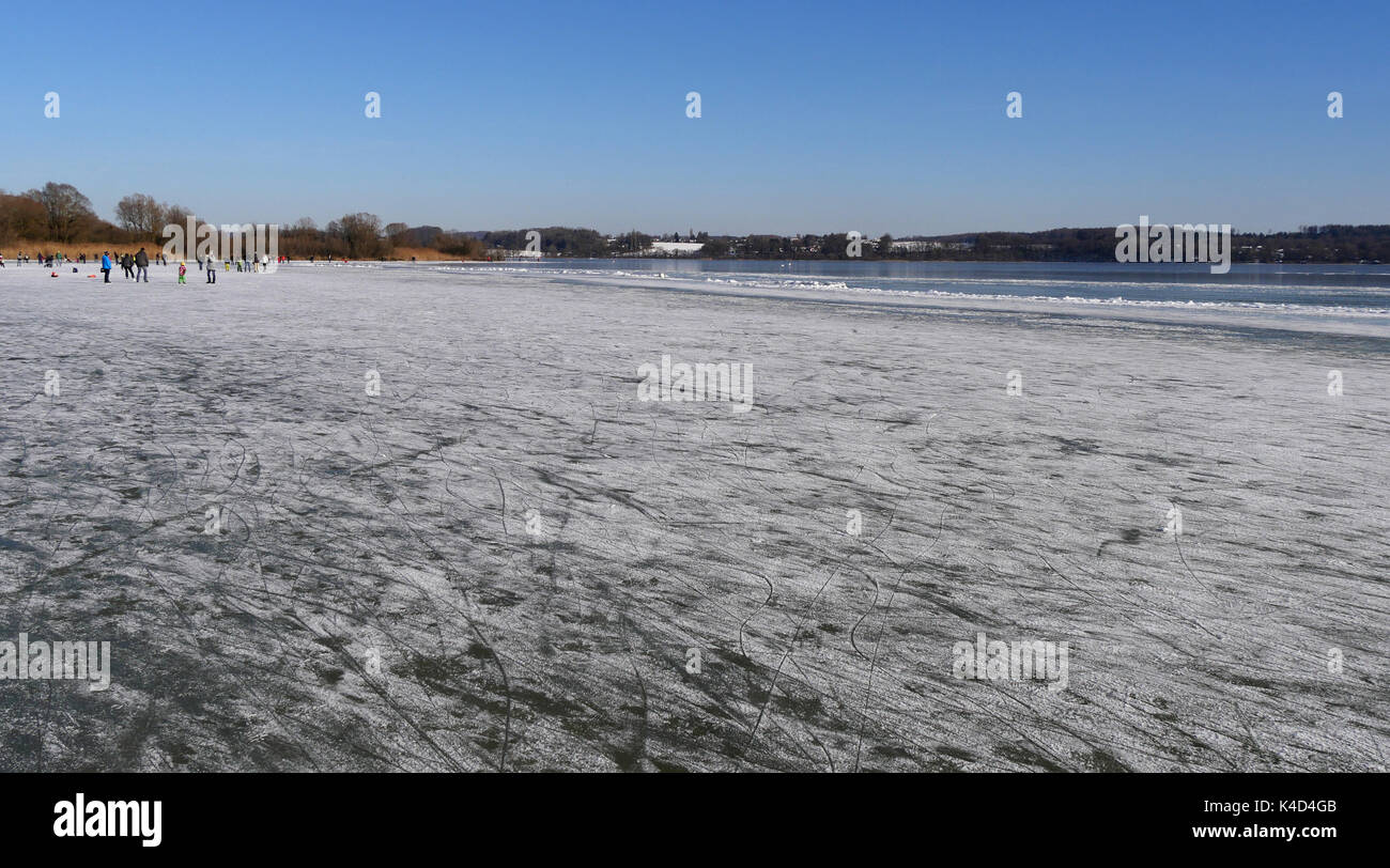 Partly frozen lake ammersee in january 2017 hi-res stock photography ...
