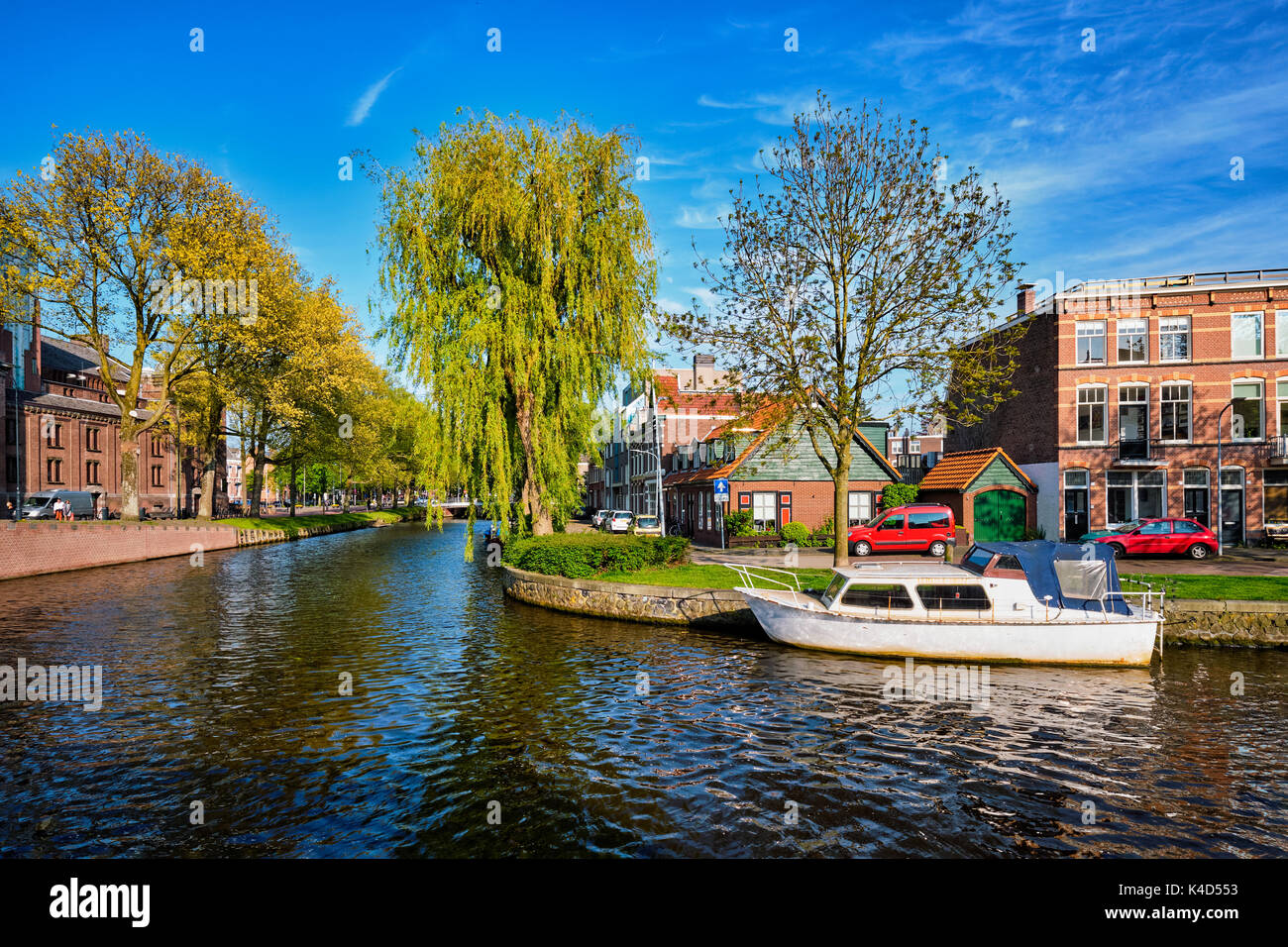 Boats, houses and canal. Harlem, Netherlands Stock Photo - Alamy