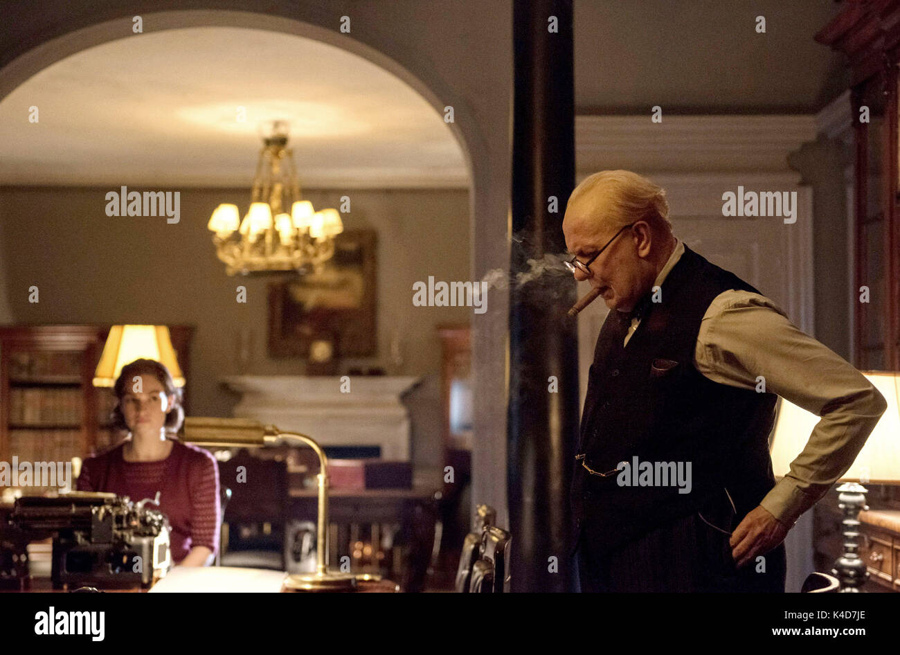 DARKEST HOUR, from left: Lily James, as Elizabeth Layton, Gary Oldman ...