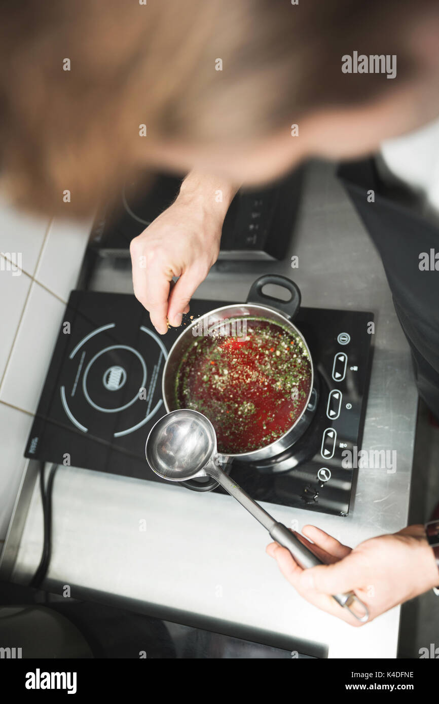 Induction cooking male hi-res stock photography and images - Alamy