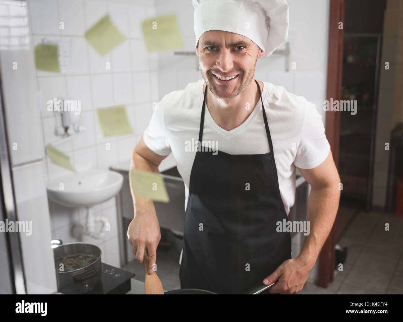 Professional cooking front cooking hi-res stock photography and images ...