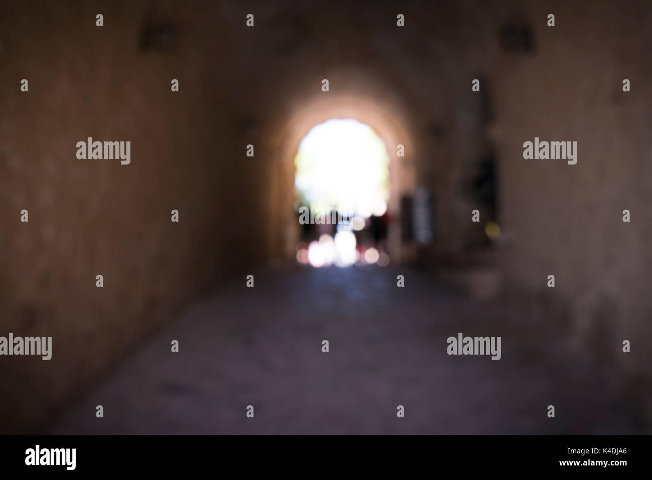 light on the end of a passage for backgrounds Stock Photo - Alamy