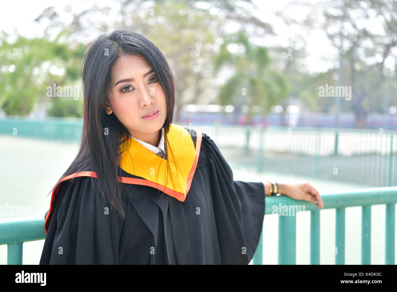 Portrait of asian cute women graduate of university Stock Photo - Alamy