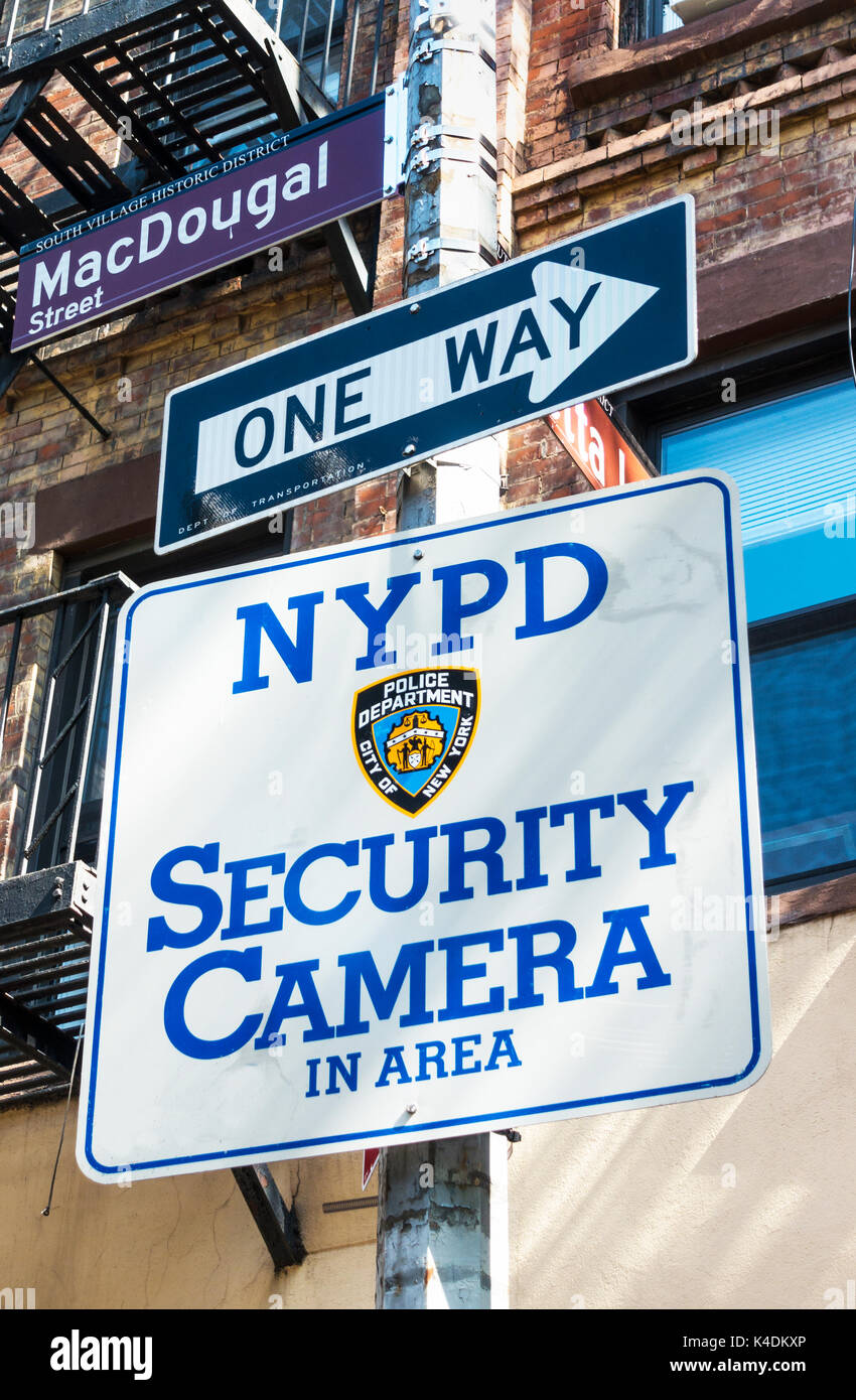 NYPD sign warning that there is a security camera operating in the area ...