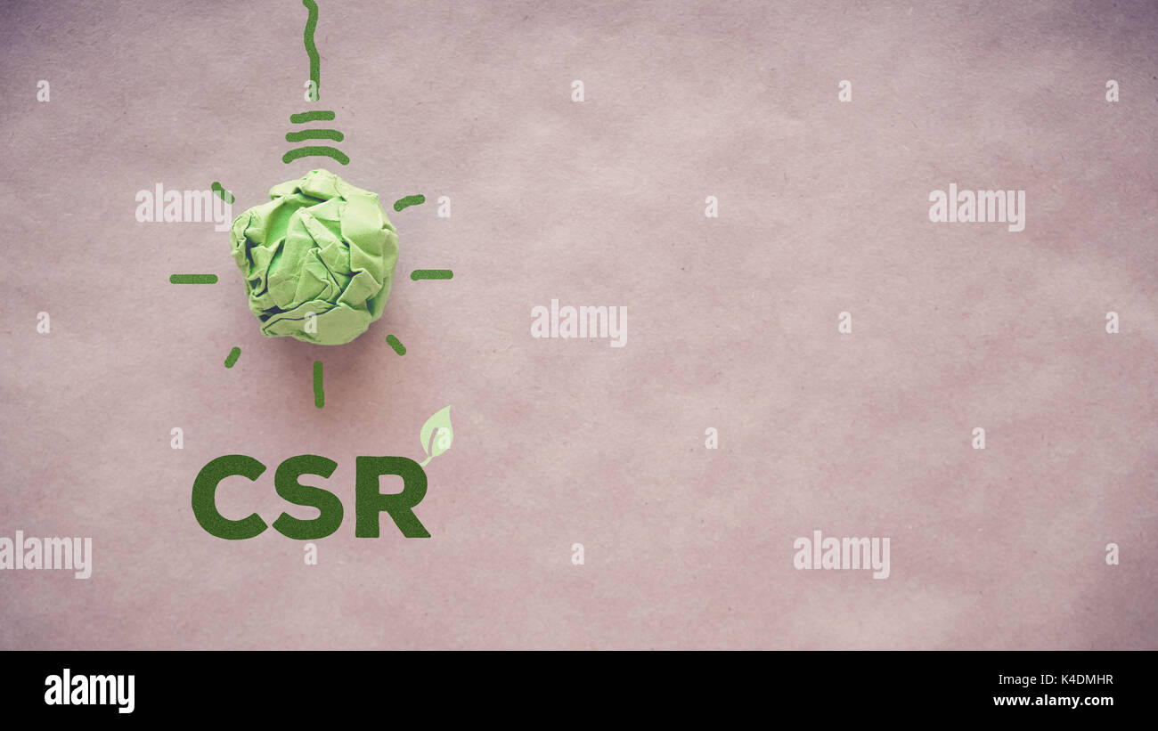 Green paper light bulb with CSR, Corporate social responsibility Stock ...
