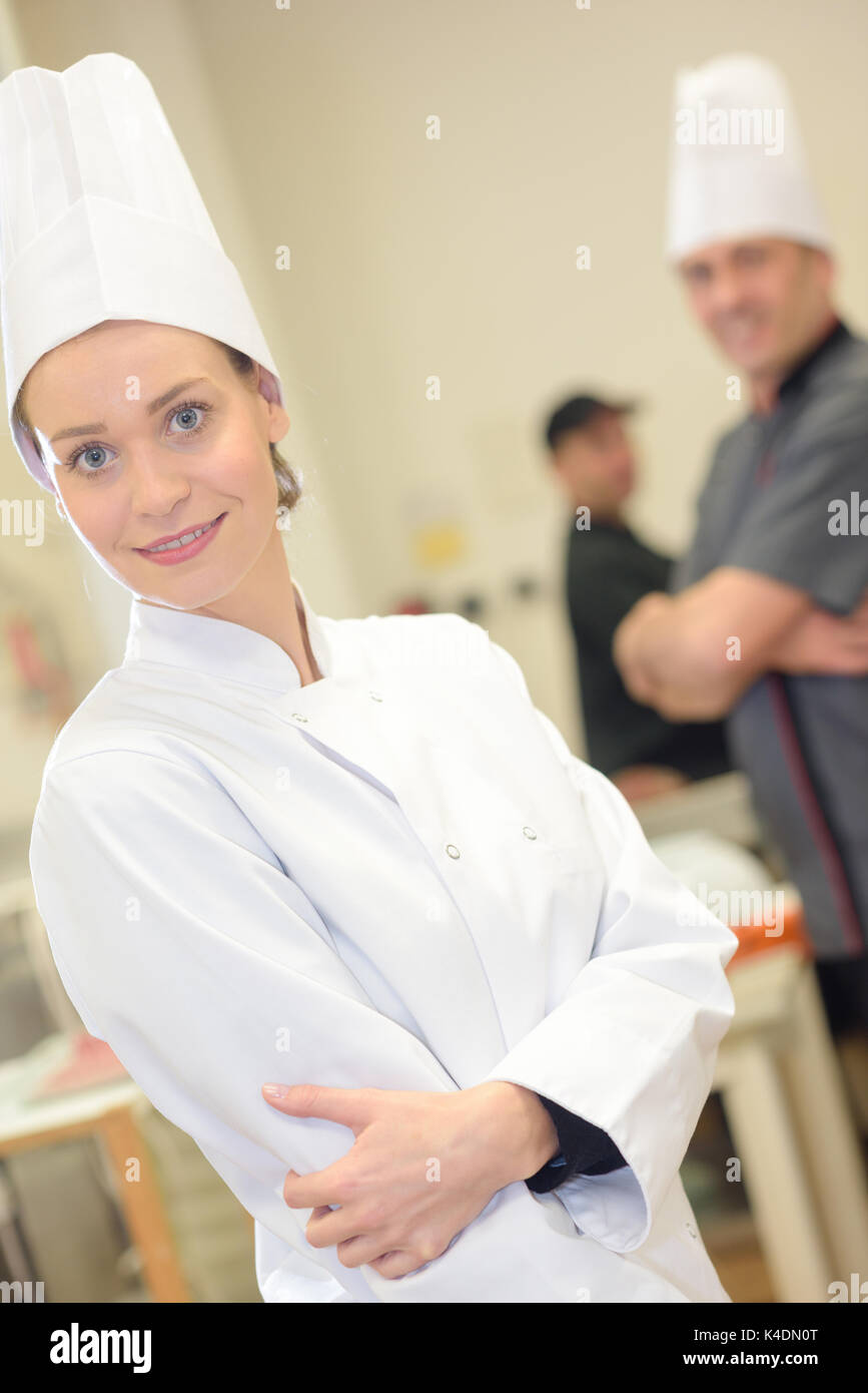female chef portrait in white uniform in restaurant kitchen Stock Photo ...
