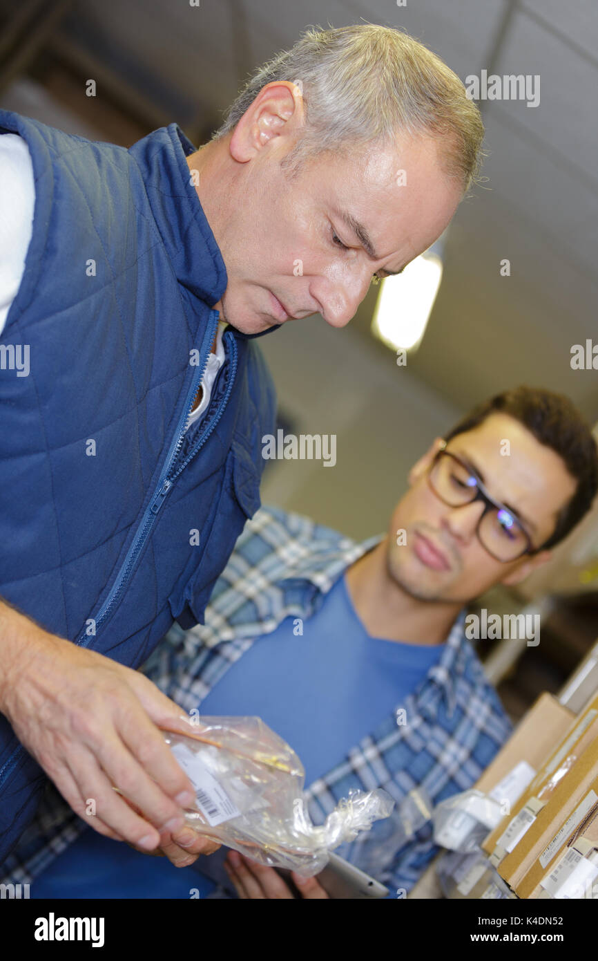 Mature warehouse manager in high hi-res stock photography and images ...