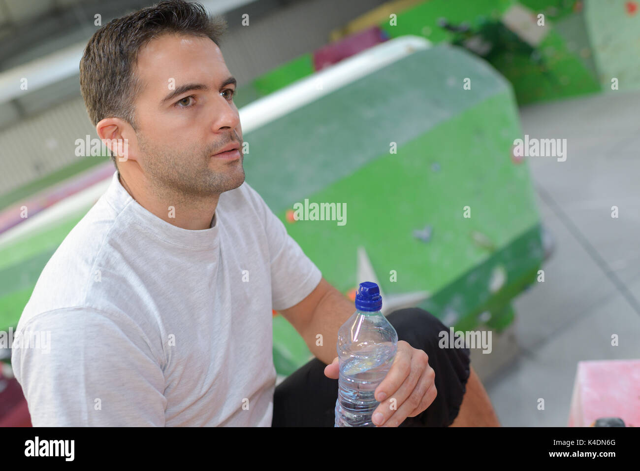young fit man having a break between climbing sessions Stock Photo - Alamy