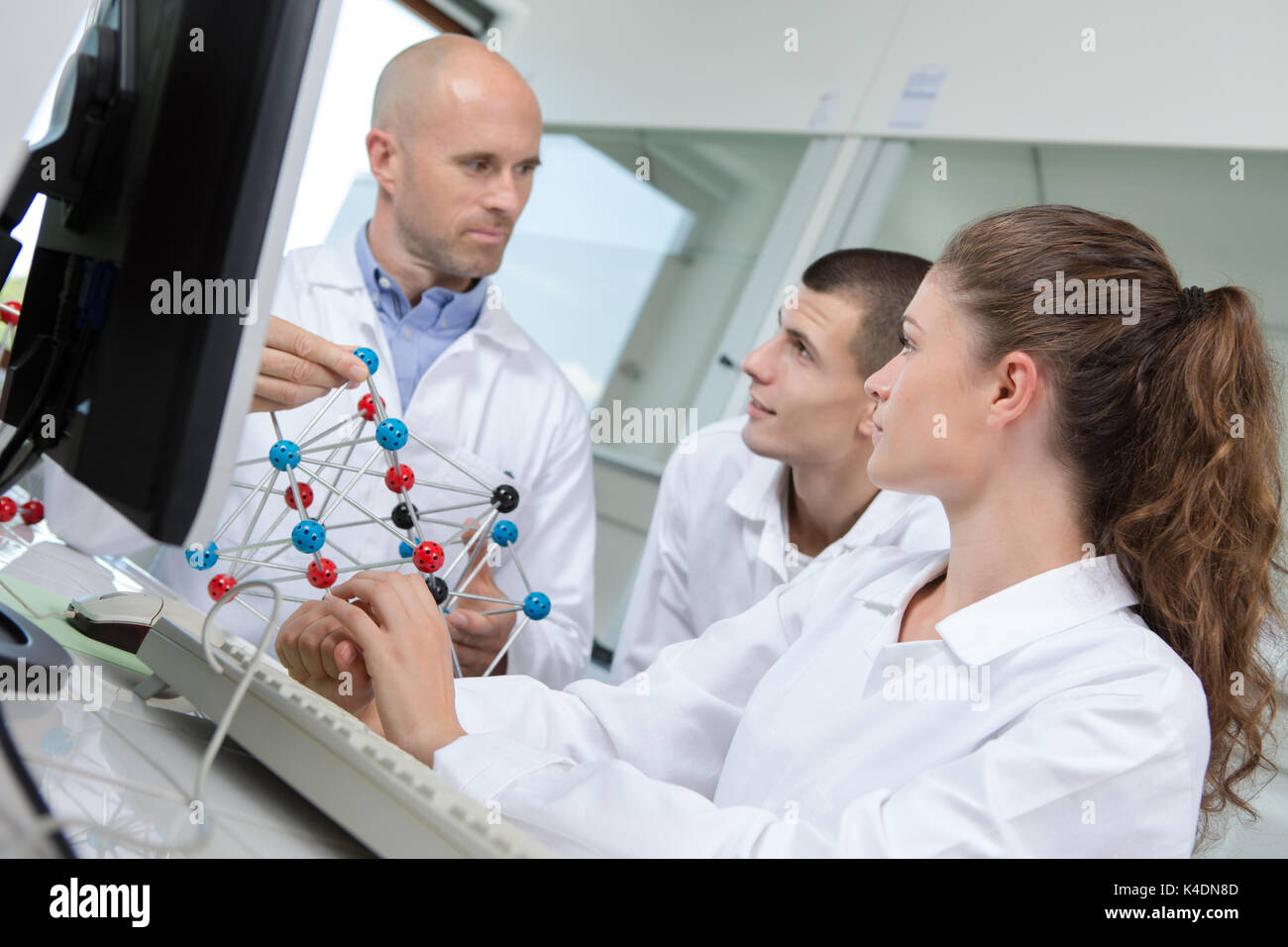 Male scientist using laptop dna hi-res stock photography and images - Alamy