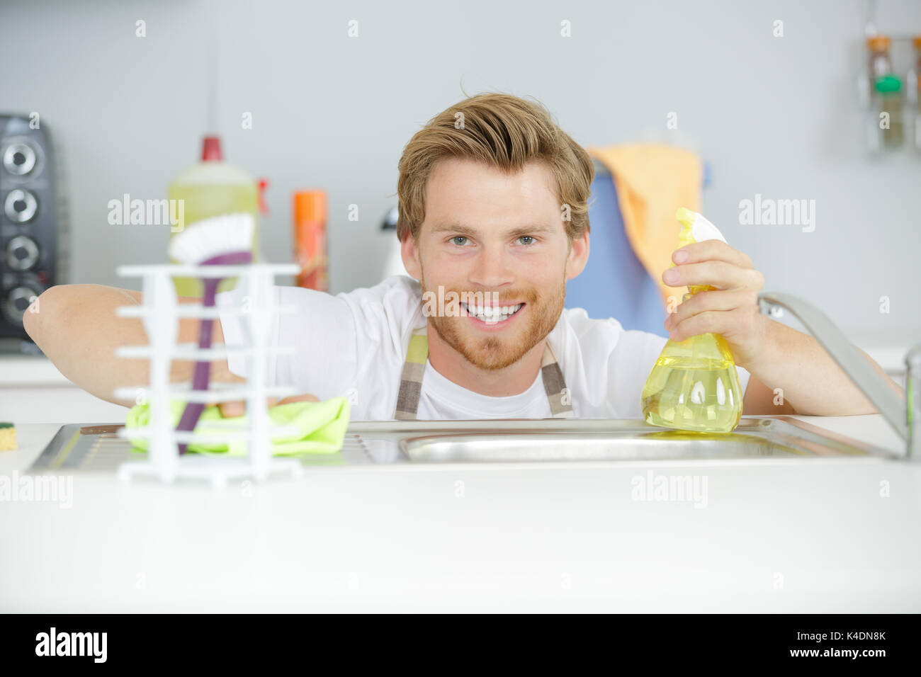 happy man cleaning his flat Stock Photo - Alamy