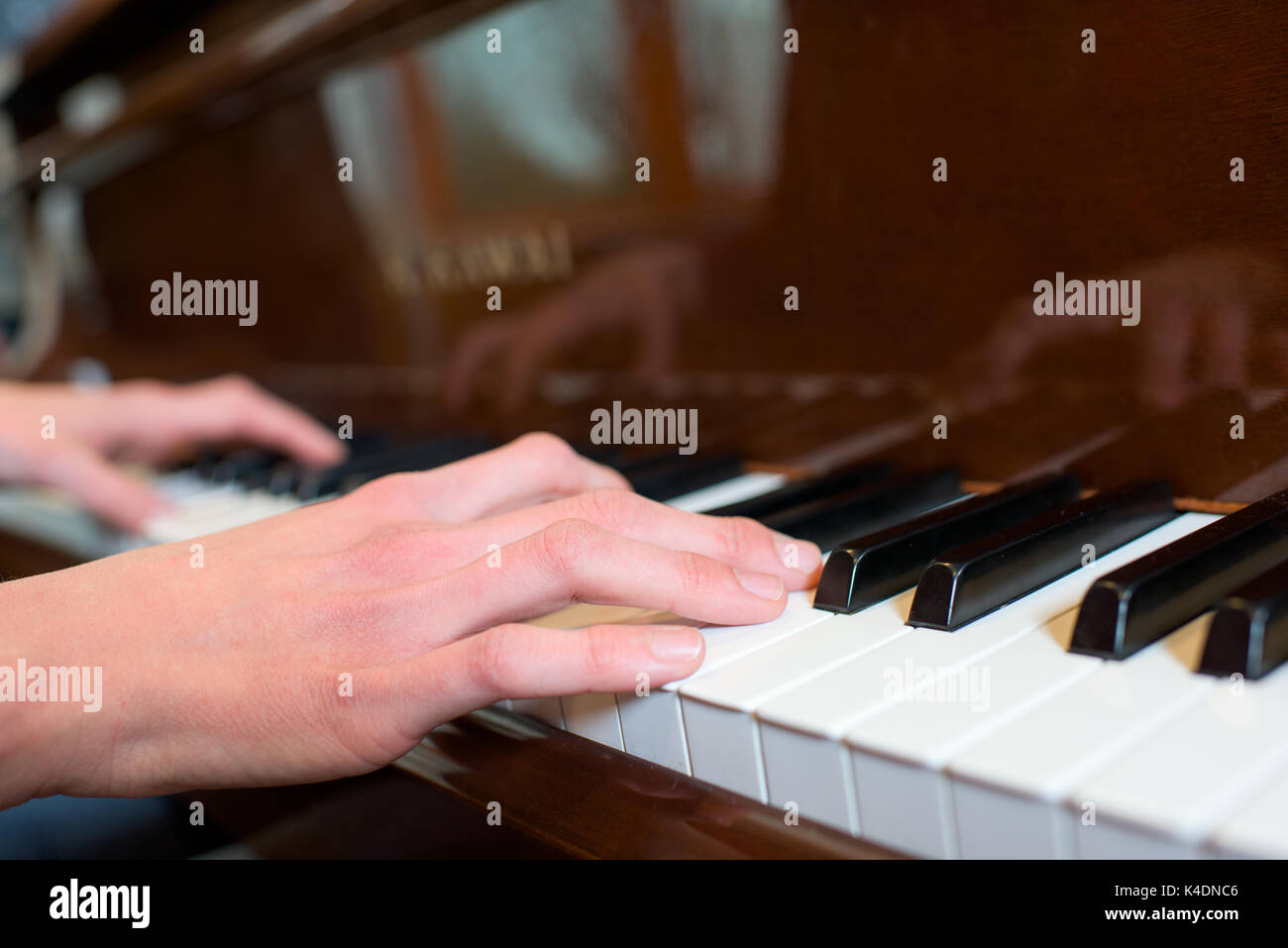 Hands on piano keyboard hi-res stock photography and images - Alamy