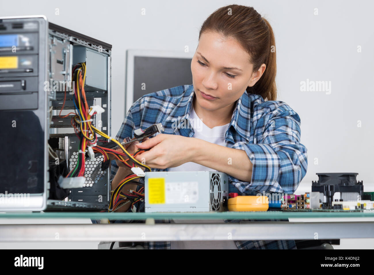 technician fixing cable in server room Stock Photo - Alamy