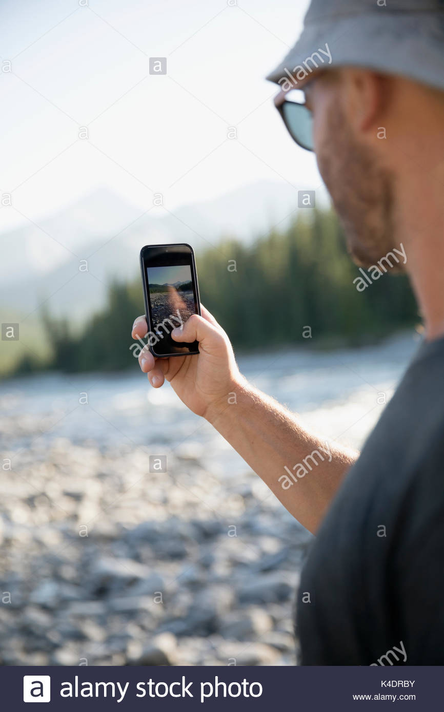 Man touching camera hi-res stock photography and images - Alamy