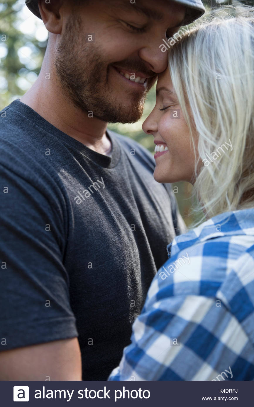 Couple hugging close hi-res stock photography and images - Alamy