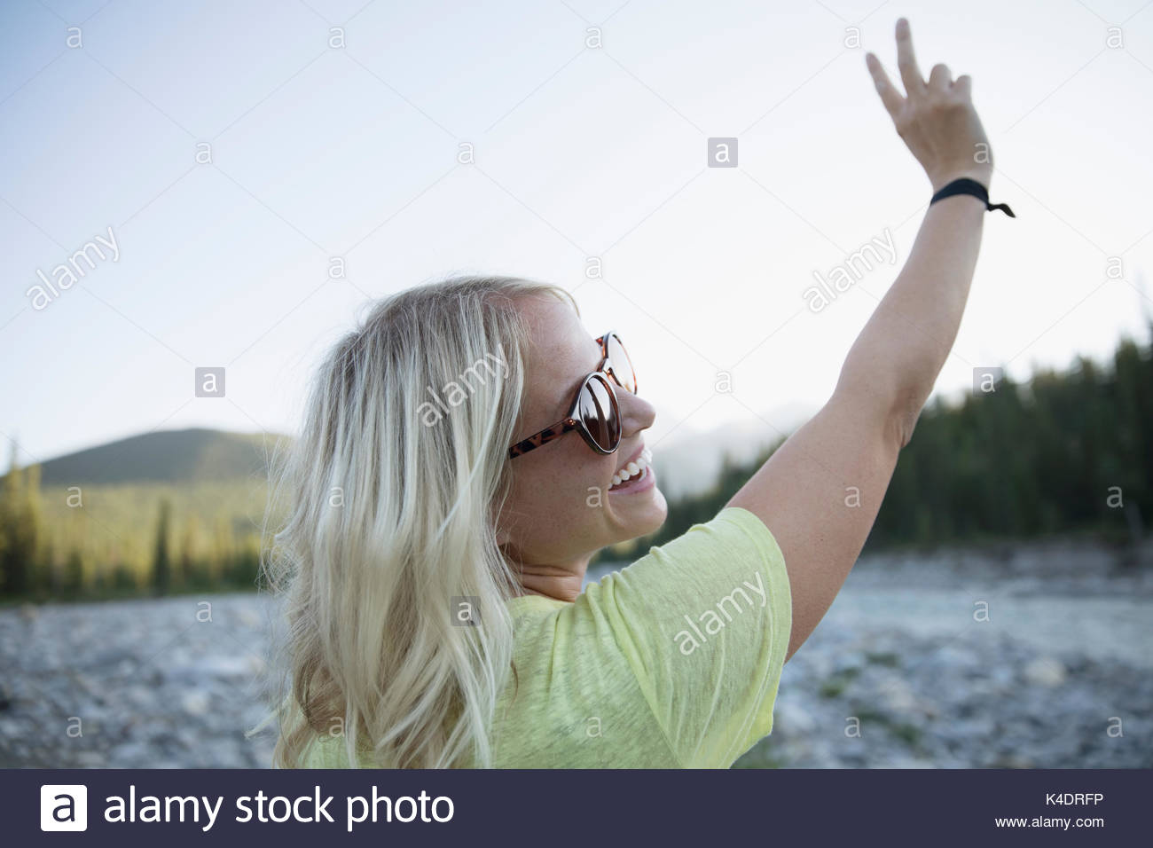 Peace sign over head hi-res stock photography and images - Alamy