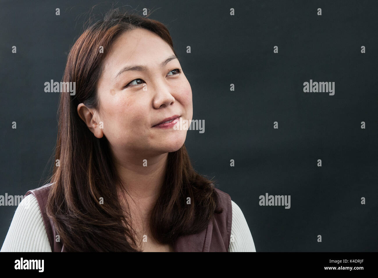 Korean-born English violinist Min Kym attends a photocall during the ...