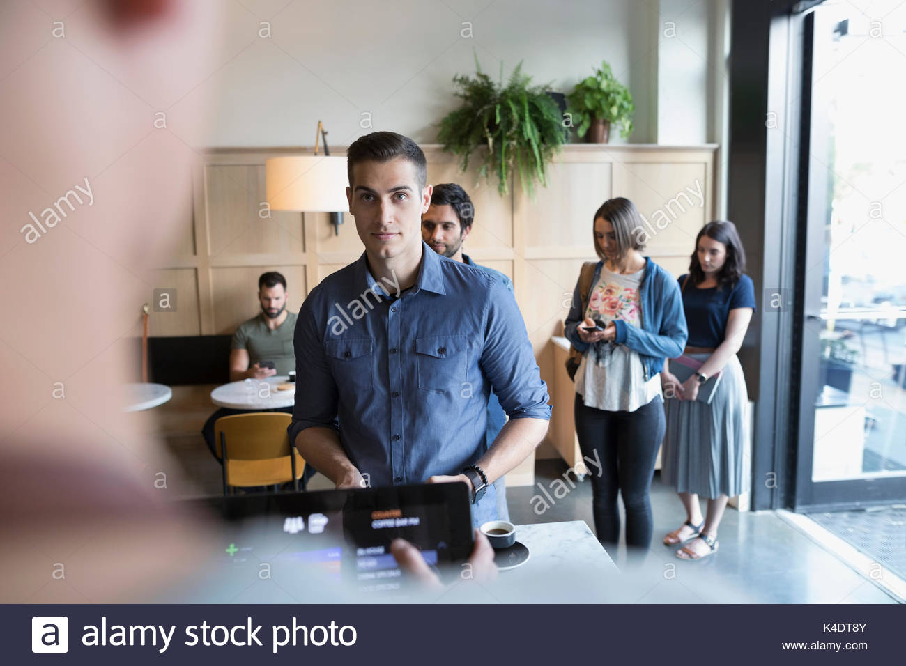 Customer waiting to order hi-res stock photography and images - Alamy
