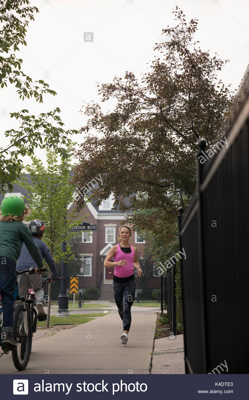Woman runner running hi-res stock photography and images - Alamy