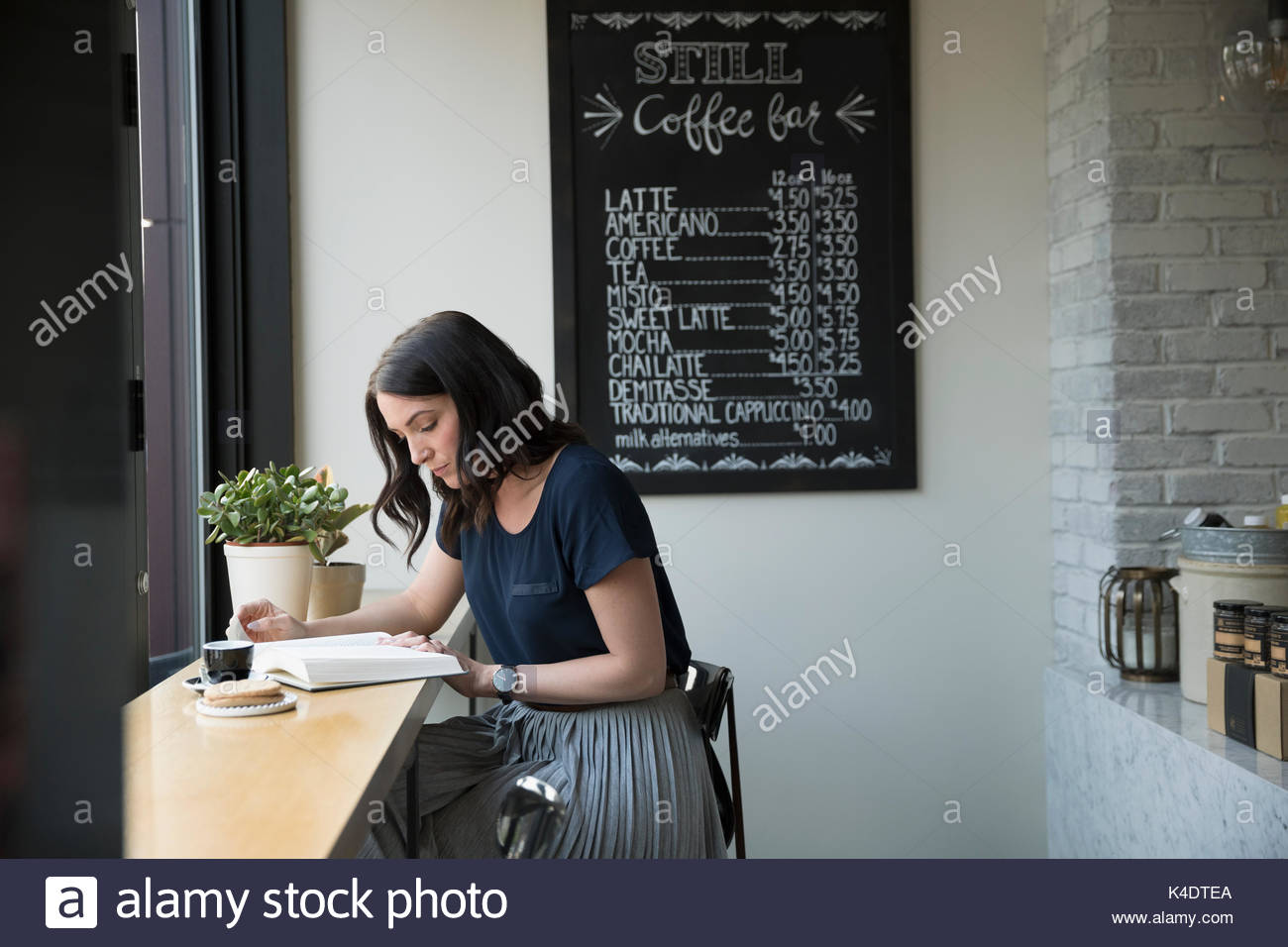 One person cafe reading coffee hi-res stock photography and images - Alamy