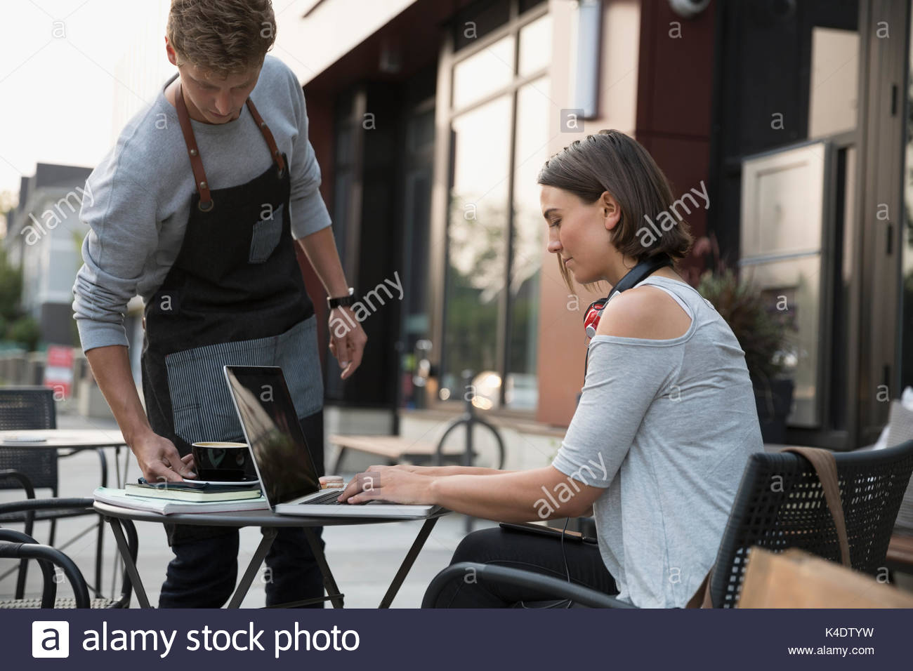 Waiter serving server hi-res stock photography and images - Alamy