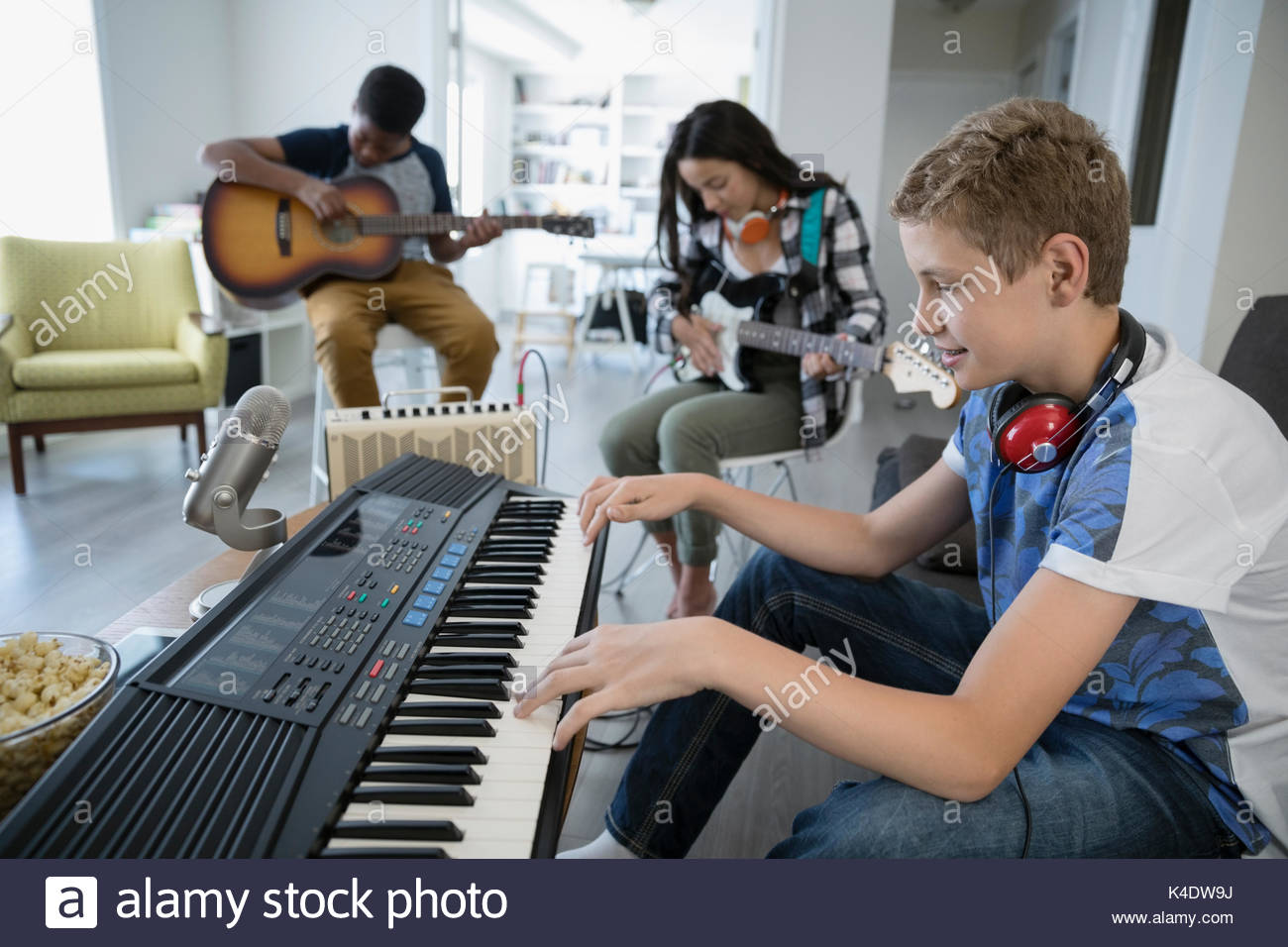 African teenager boy playing instrument hi-res stock photography and ...