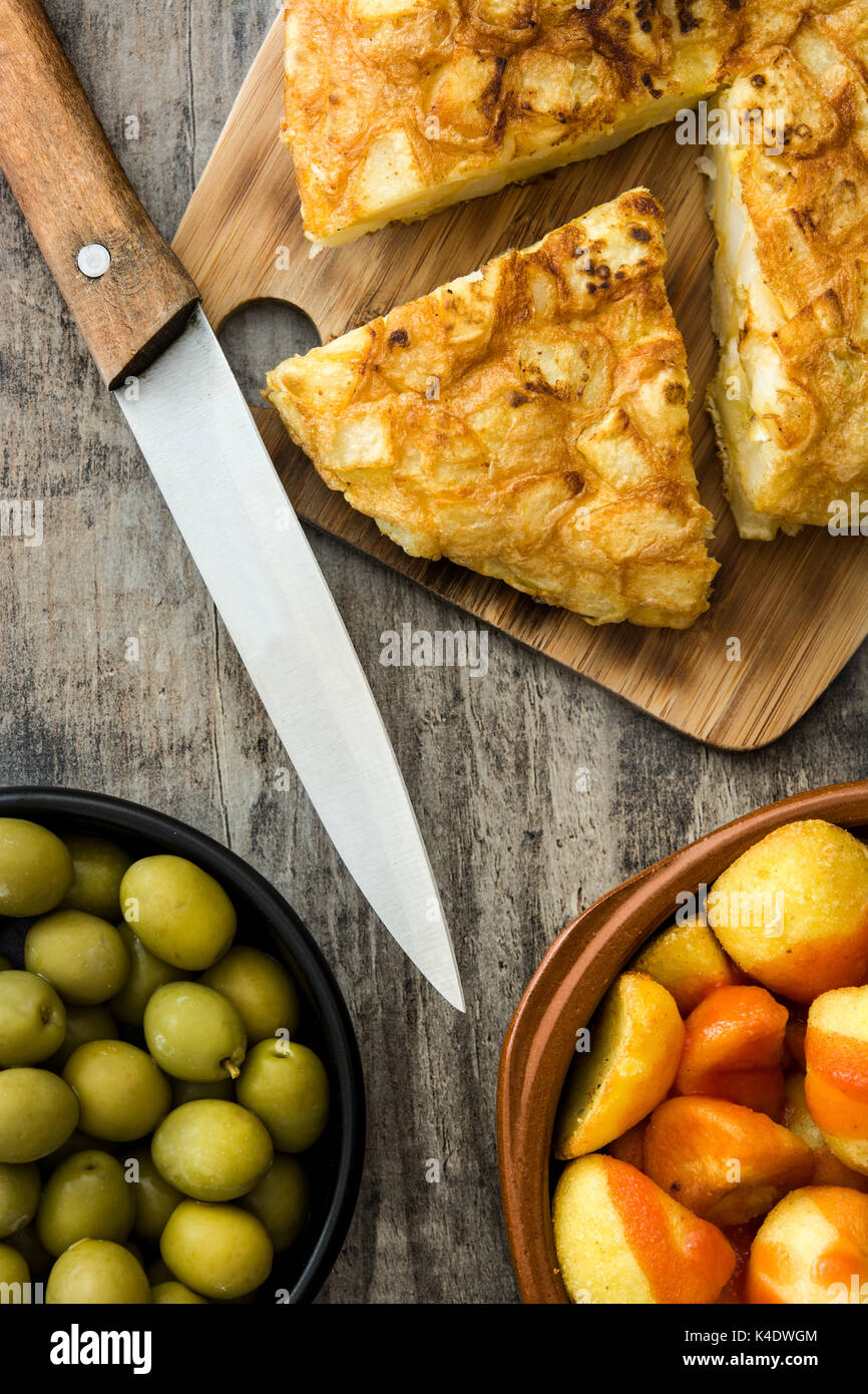 Traditional spanish tapas. Croquettes, olives, omelette, ham and ...