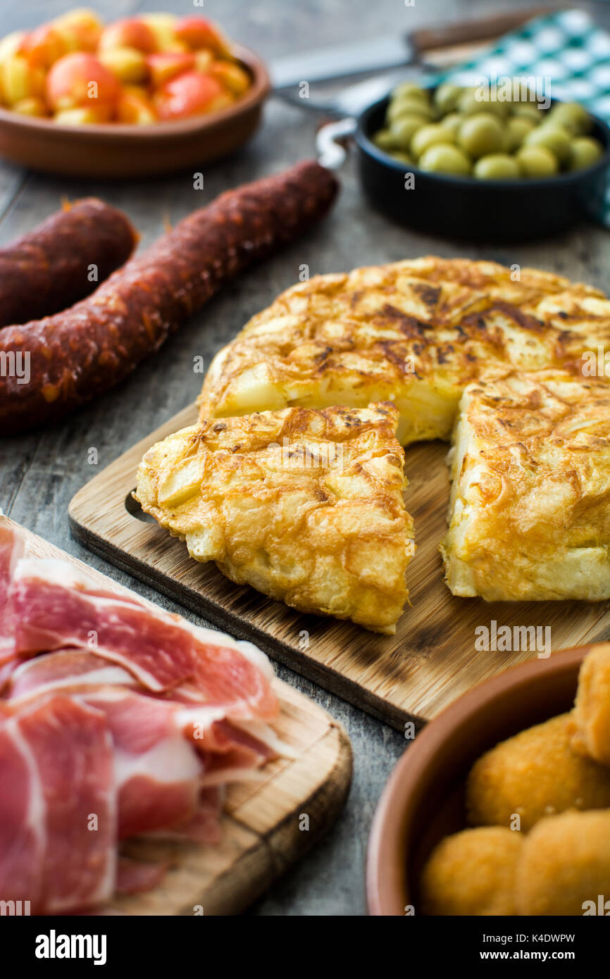 Traditional spanish tapas. Croquettes, olives, omelette, ham and ...