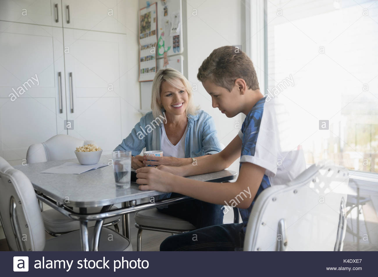 Mother kitchen talking table hi-res stock photography and images - Alamy