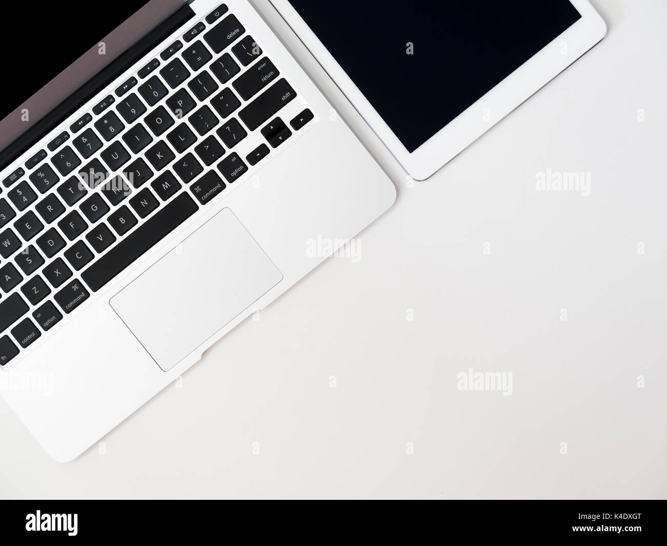 notebook and tablet top view Stock Photo - Alamy