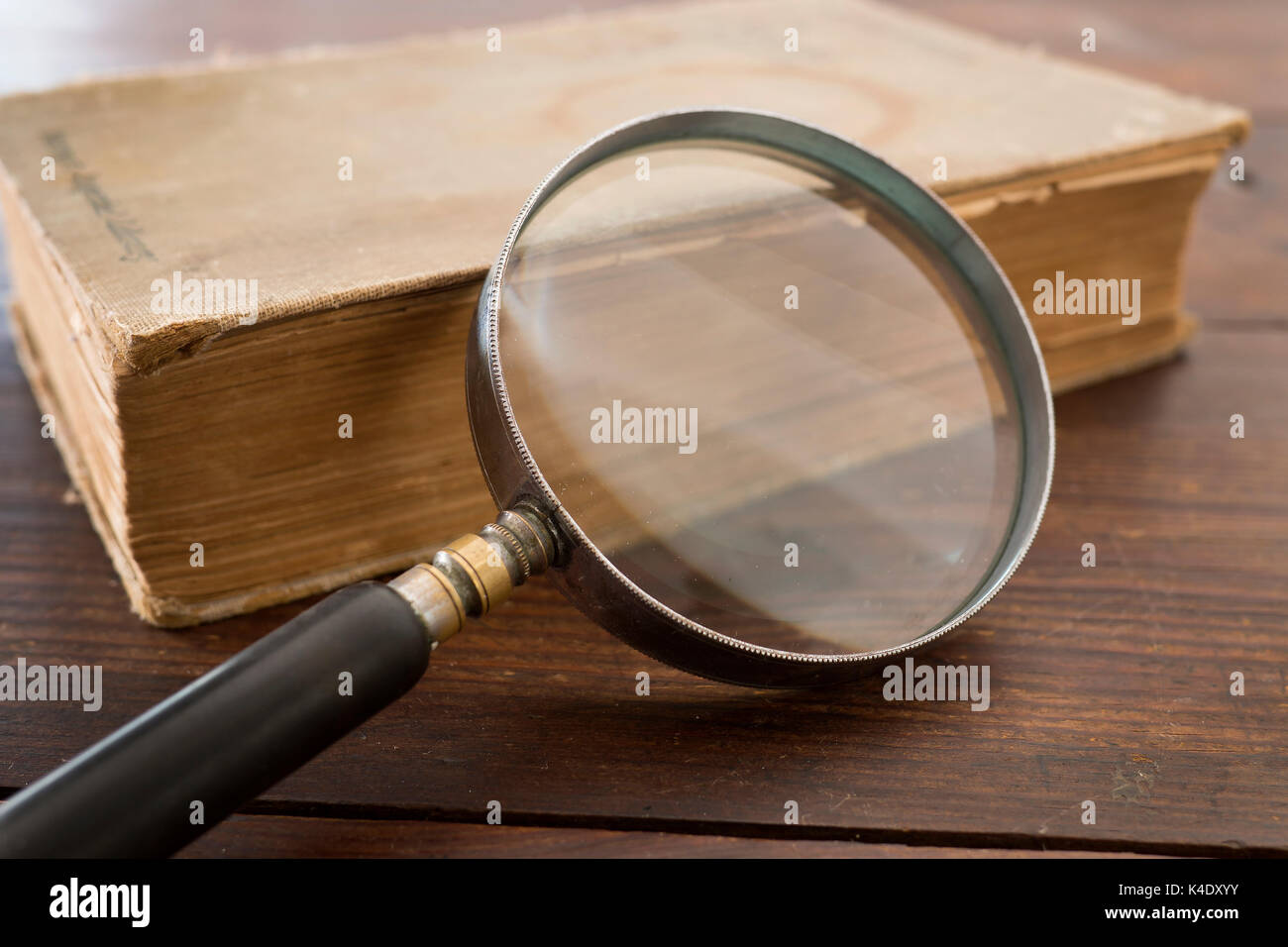Magnifying glass old document paper hi-res stock photography and images ...