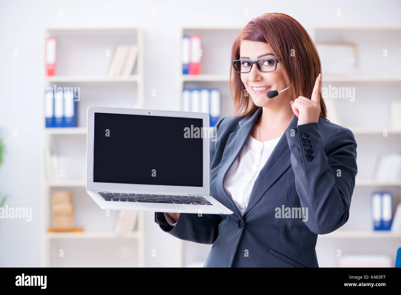 Call center operator working with clients Stock Photo - Alamy