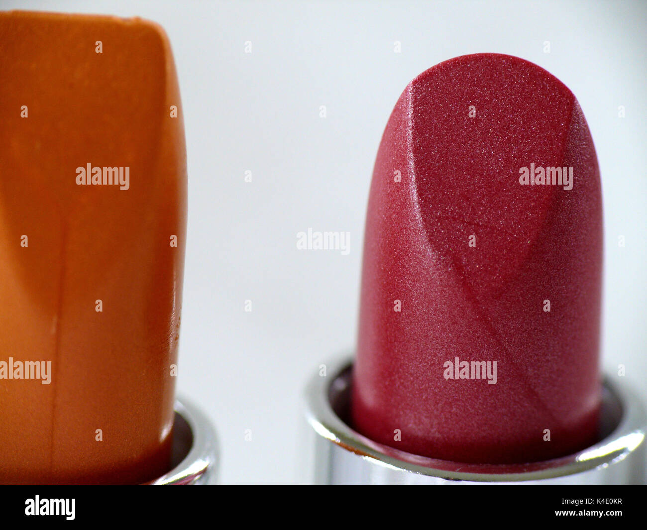 Two red lipsticks hi-res stock photography and images - Alamy