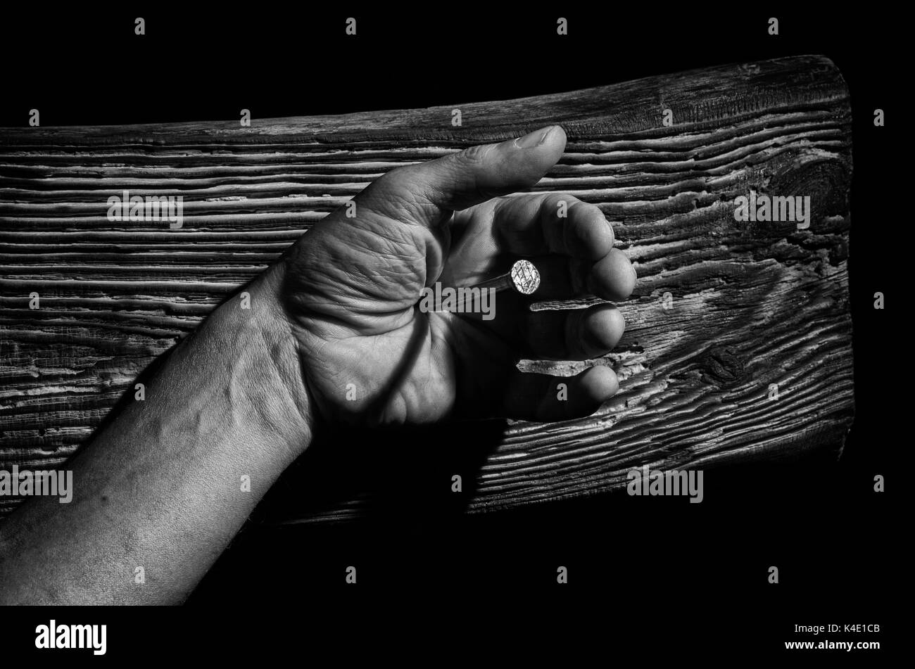 Hand nailed to cross hi-res stock photography and images - Alamy