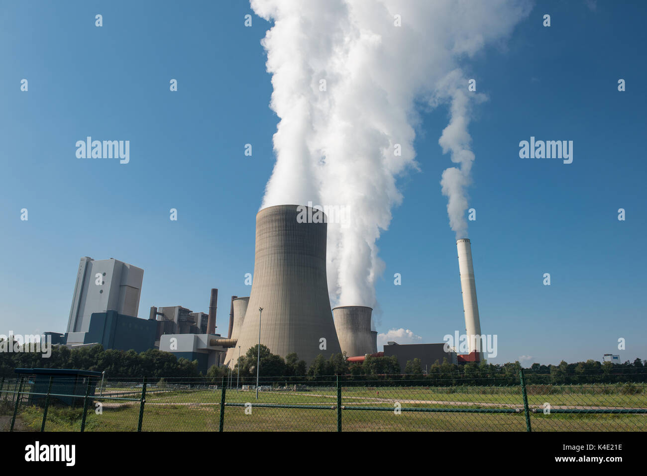 Lignite power plant for electricity generation - steam rises from the ...