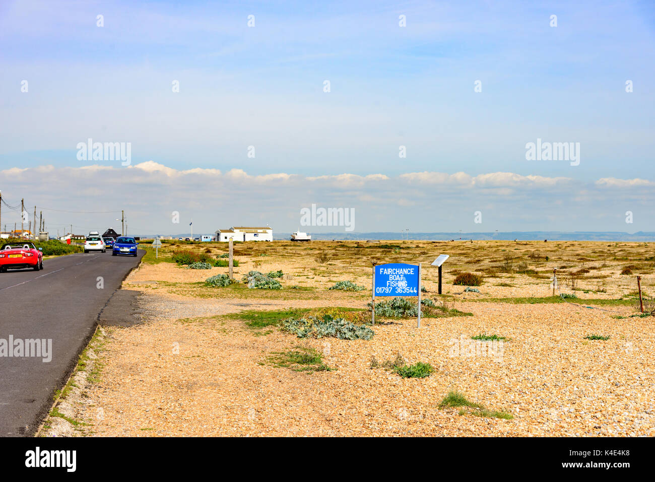 Road running through Dungeness Estate Kent Stock Photo - Alamy