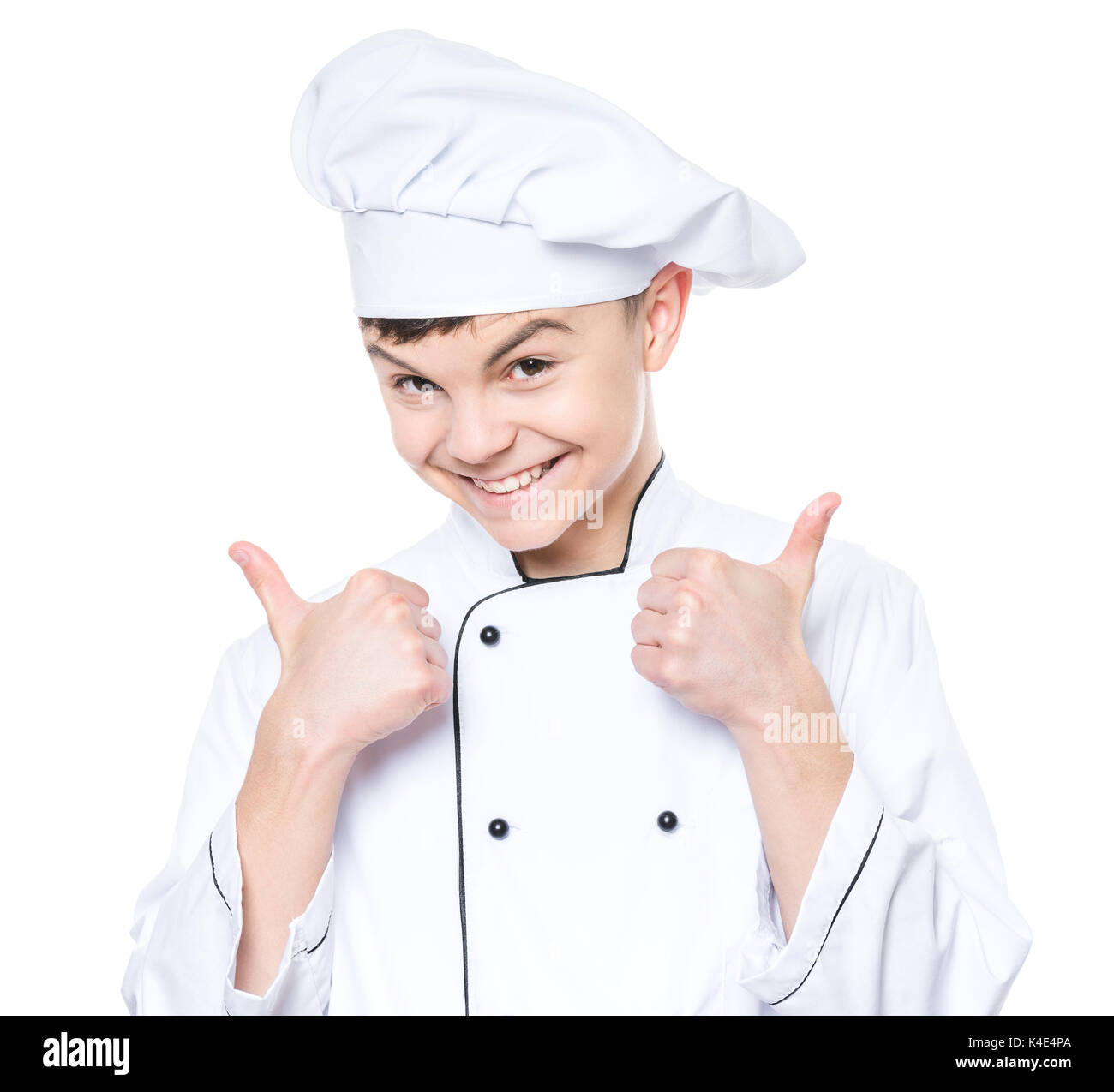 Teen boy wearing chef uniform Stock Photo - Alamy