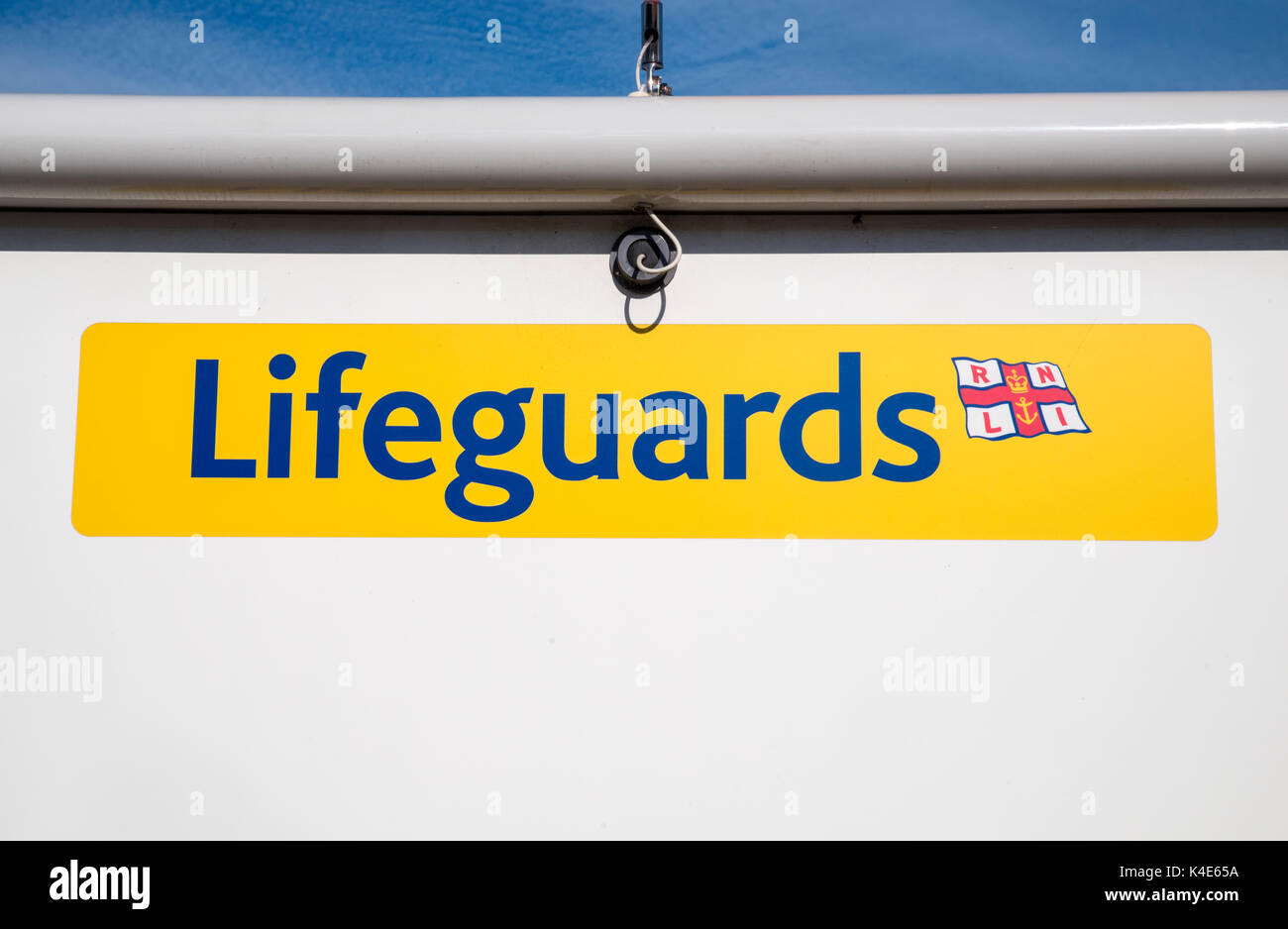 SWANAGE, UK - AUGUST 16TH 2017: A Lifeguard sign on a kiosk on Swanage ...