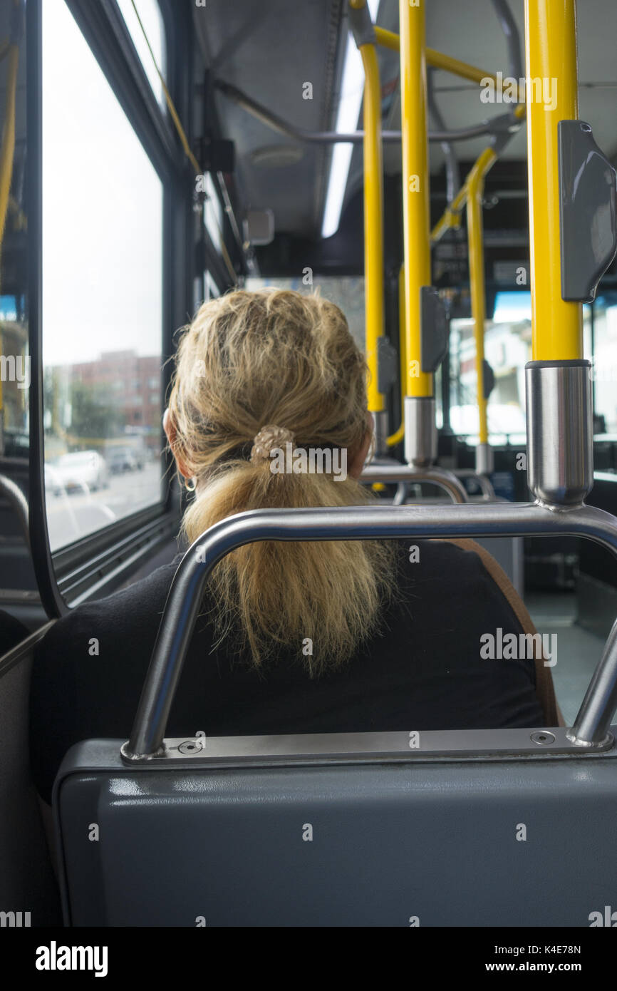 Woman on bus back view hi-res stock photography and images - Alamy