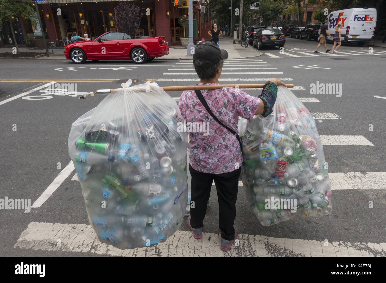 Chinese woman makes a business out of collecting aluminum cans in ...