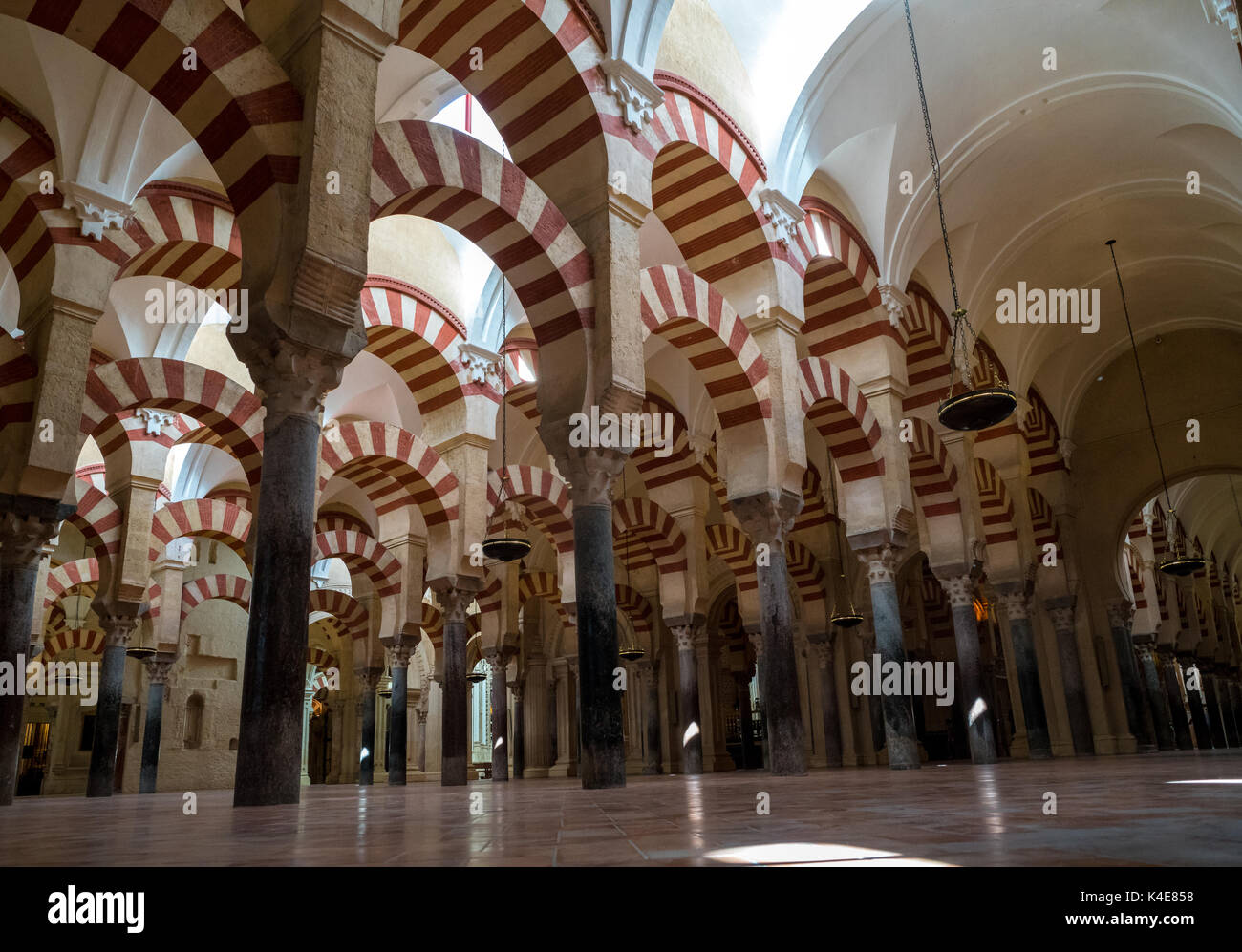 Alternating red and white voussoirs of the arches hi-res stock ...