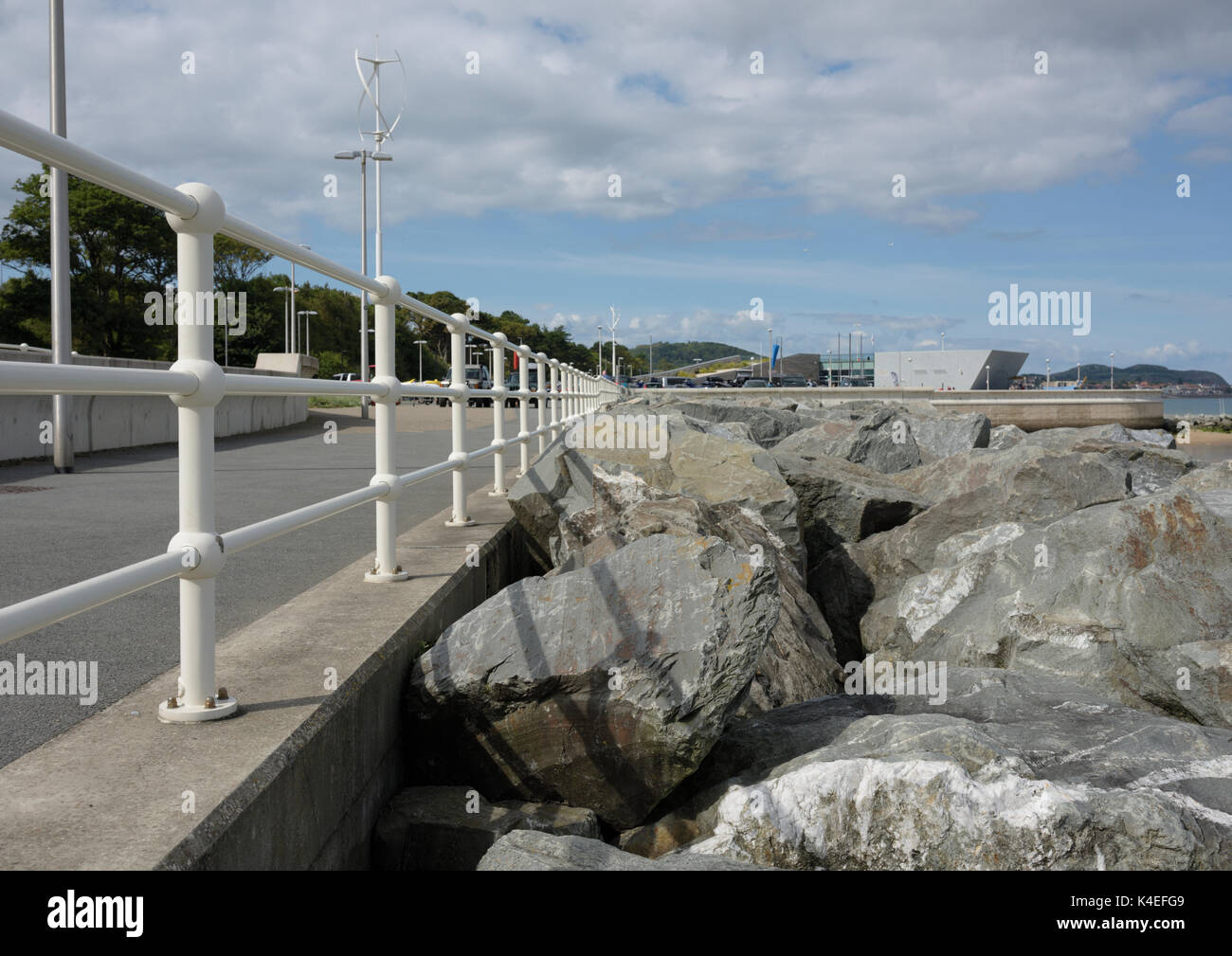 White guard railing and rock armour revetment, flood defences, porth ...