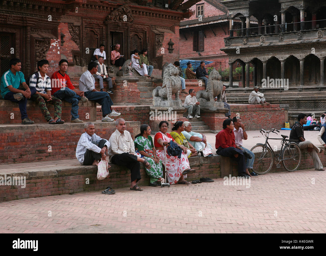 Urban residents in daily life. Townspeople and pilgrims resting near ...