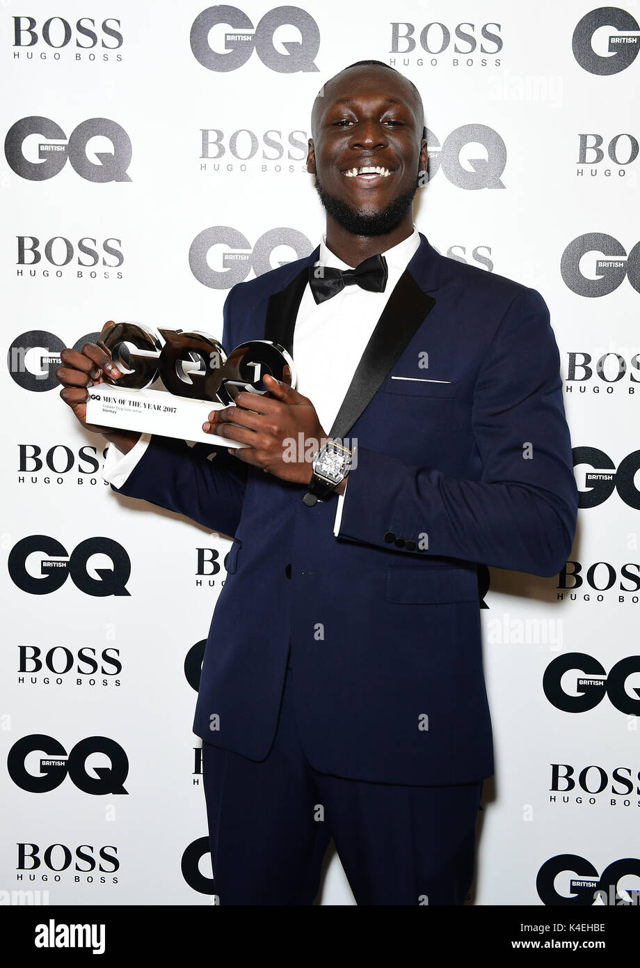 Stormzy with his Copper Dog Whiskey Solo Artist award during the GQ Men ...