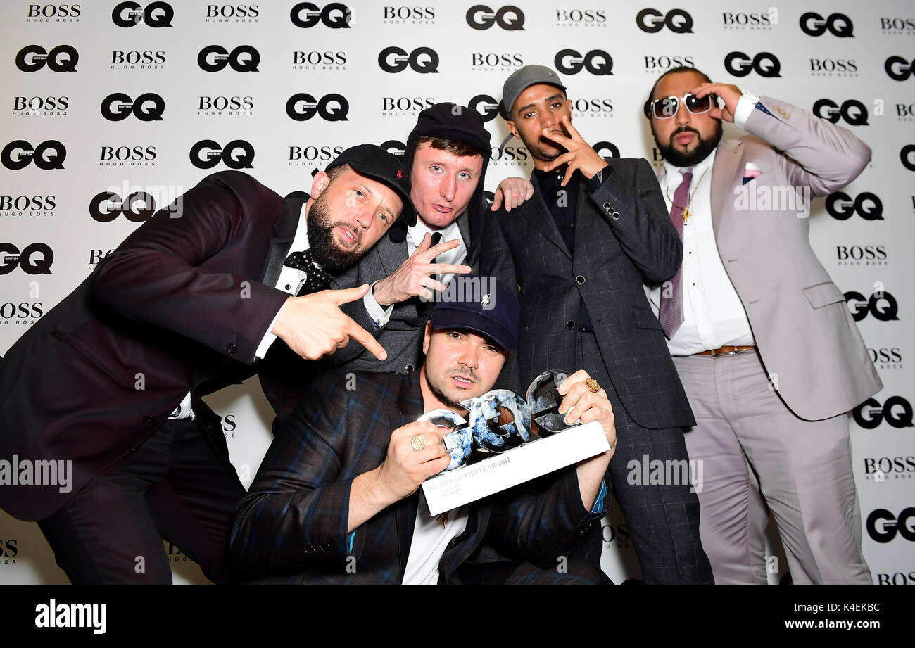 Kurupt FM with their Garage Act award during the GQ Men of the Year ...